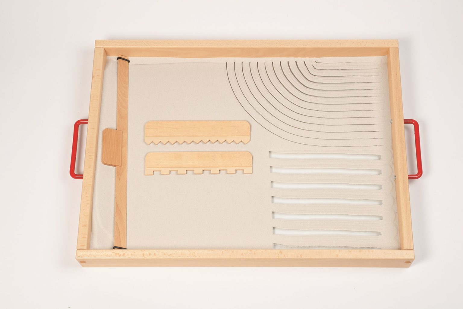 A sand table for sensory and motor skill activities. Designed by Dusyma company for Ludimage.